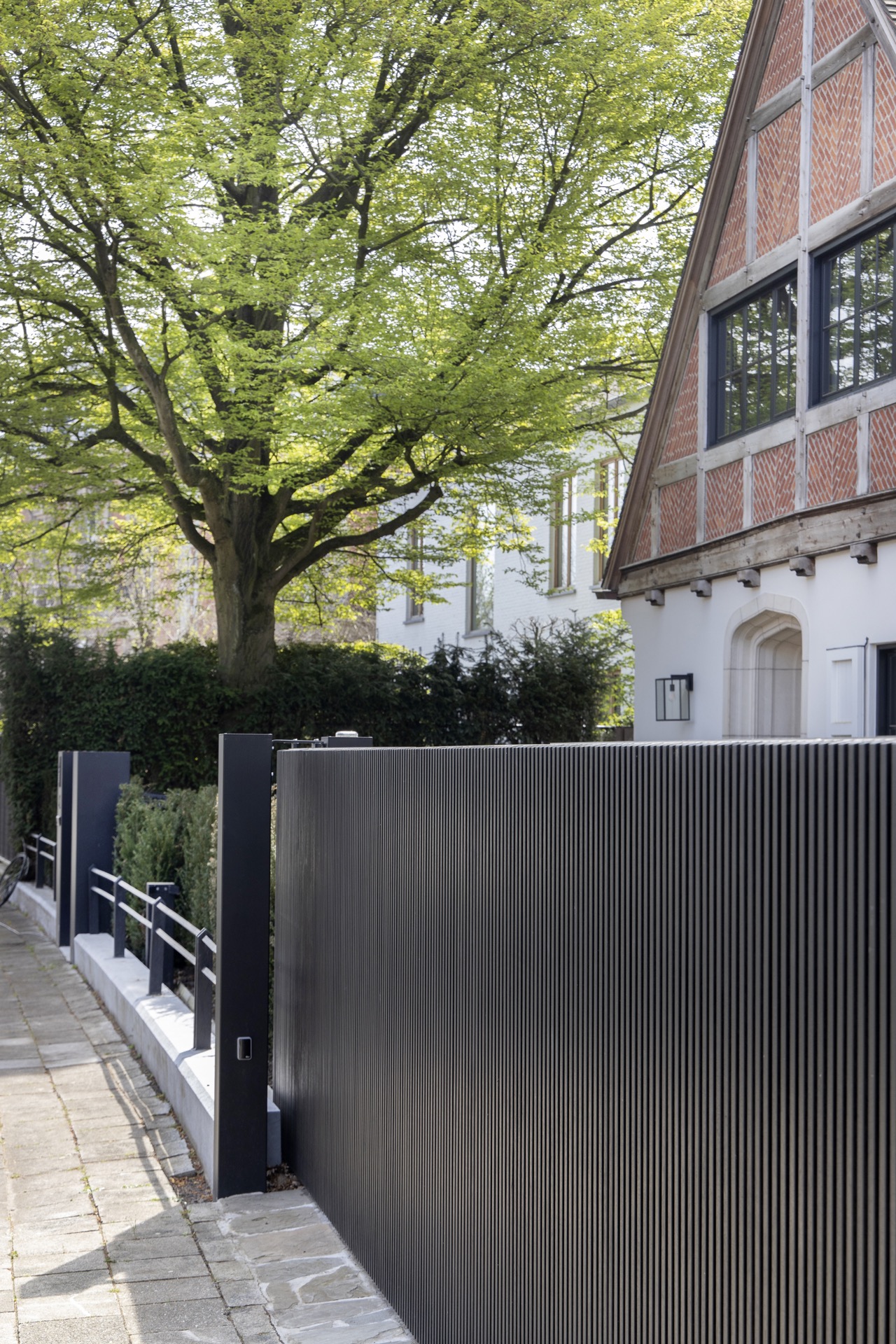 Timeless sleek black garden gates